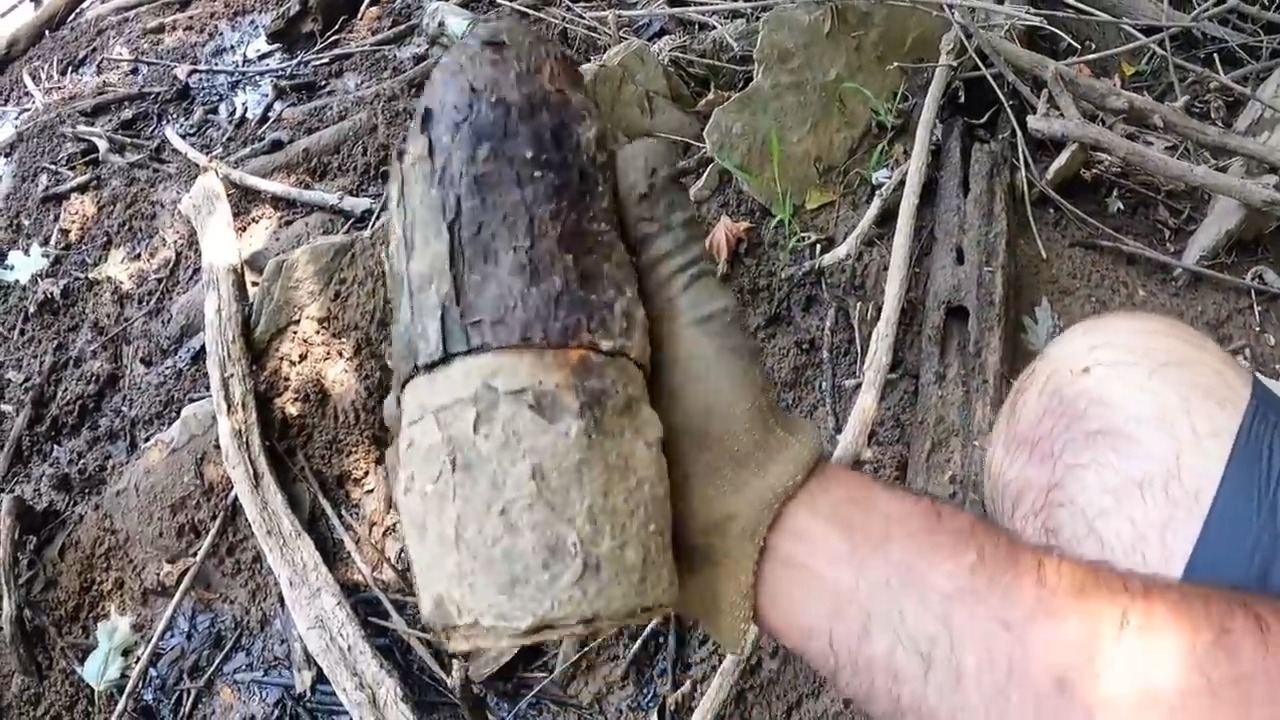 He was digging through river junk - then found a World War II anti ...