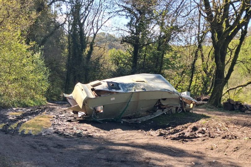 Mysterious caravan dumped in Devon woodland