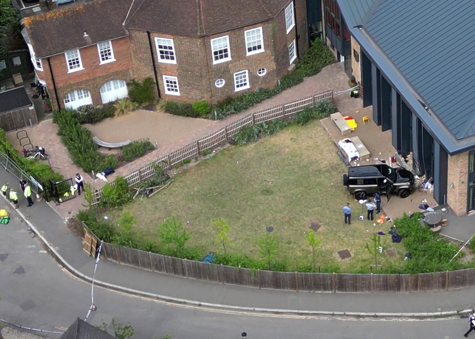 Woman charged with death by dangerous driving after Wimbledon school crash
