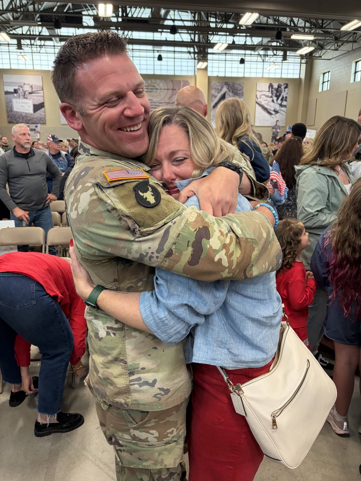 Cedar Rapids National Guardsmen, police officer surprises his kids with ...