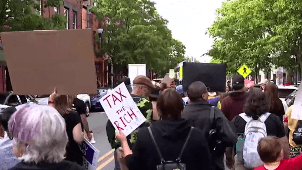 Hundreds rally in downtown Asheville for May Day