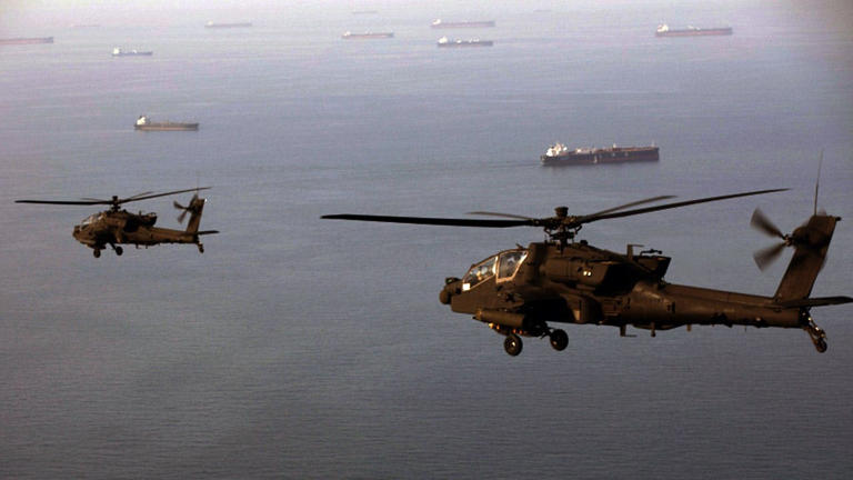 Cargo ship attacked by small craft near Strait of Hormuz, UK maritime ...