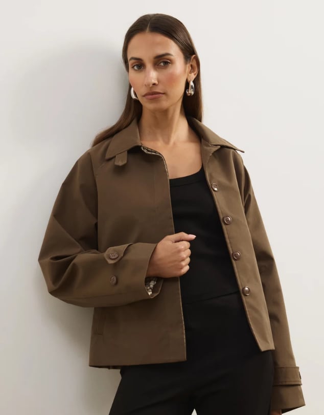 A trench coat is the ultimate shortcut to looking polished. I've found ...