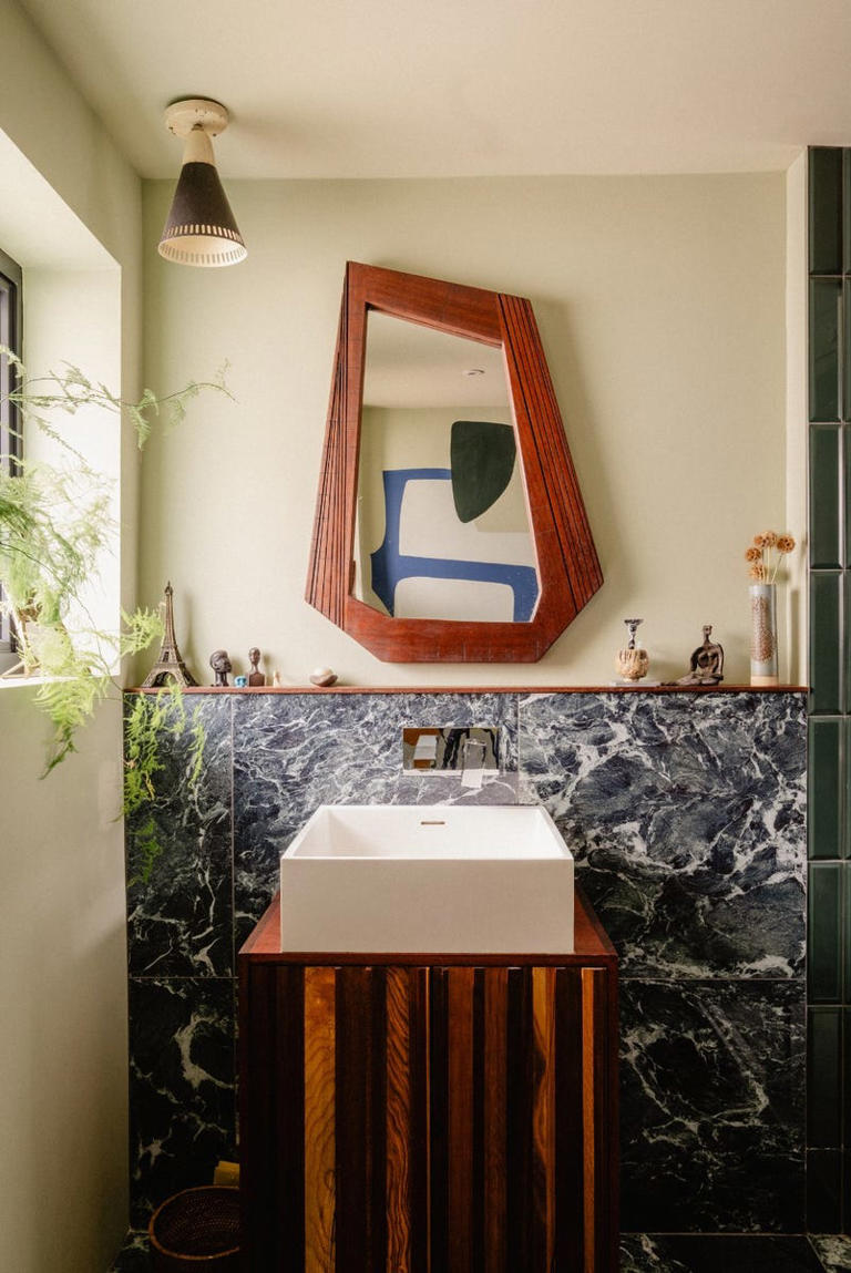 Inside a colourful St Leonards home with a private garden that keeps ...