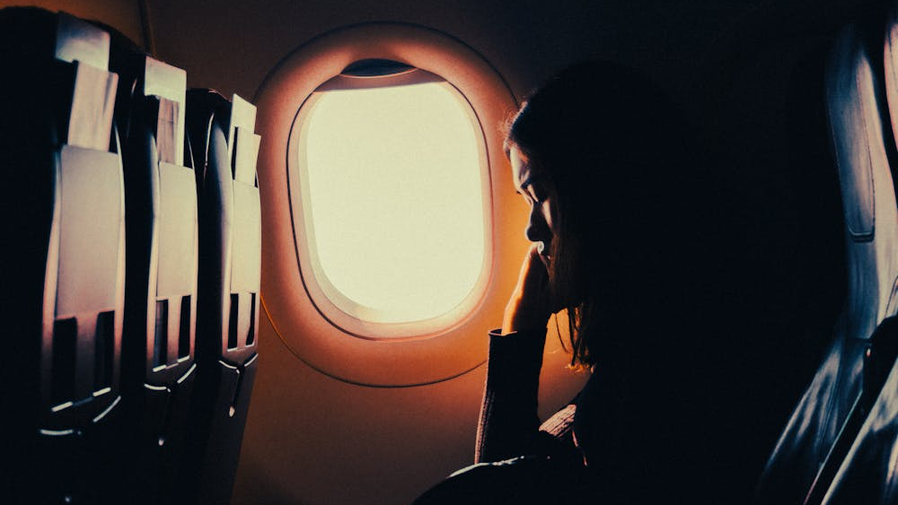 7 tips for sleeping better on a plane, according to flight attendants