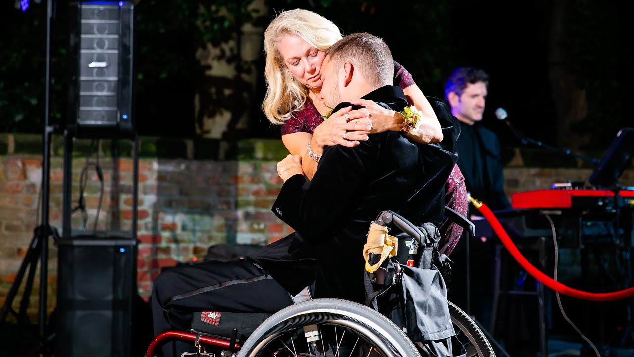 Emotional mother and son wedding dance
