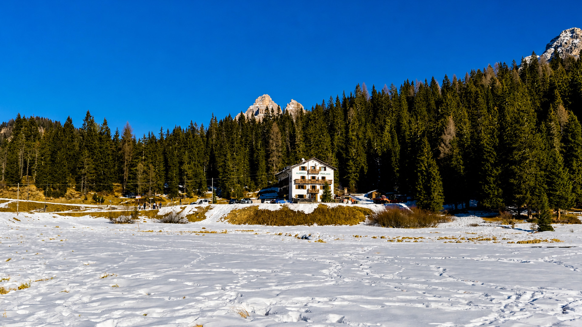 Take a scenic ice lake walk in Misurina (4K)