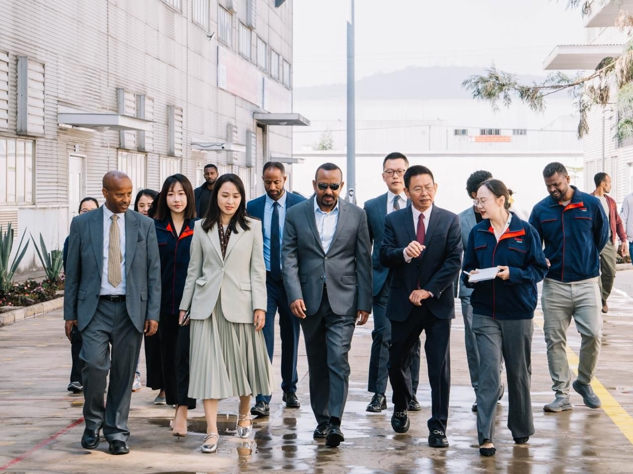 PM Abiy reviews Gobeze solar cell manufacturing plant at Huajian ...