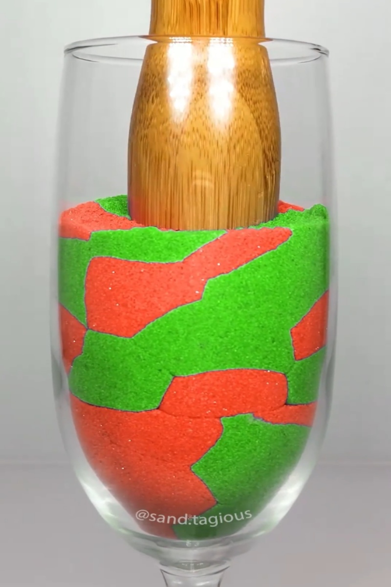 Green and orange sand glass press art