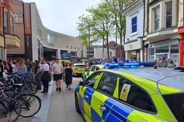 Police 'lock down' Oxford square following 'assault on busker'