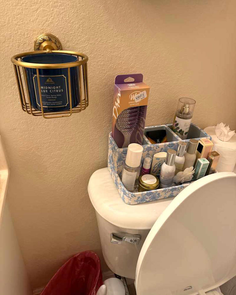 My mother just invented the most gorgeous way to use a toilet paper holder