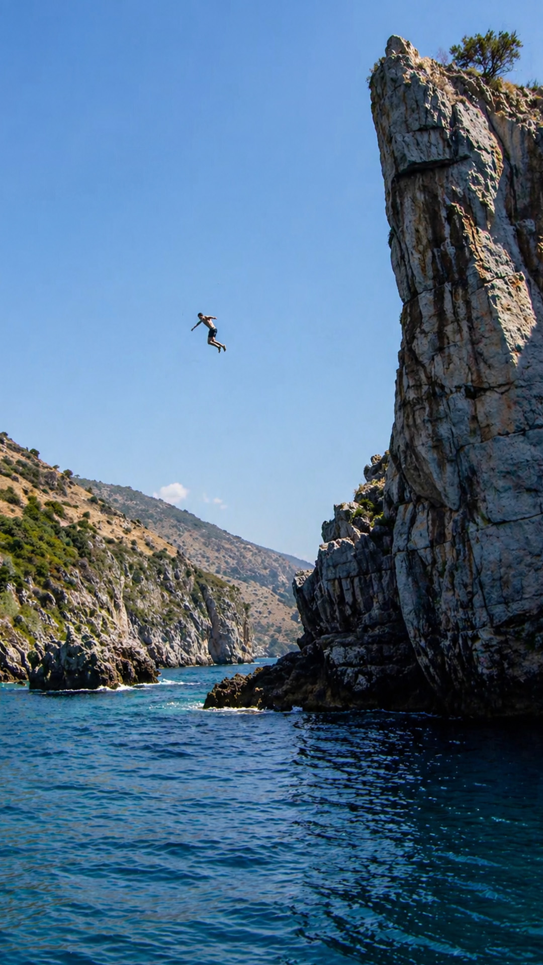 A cliff jump that shows height and control