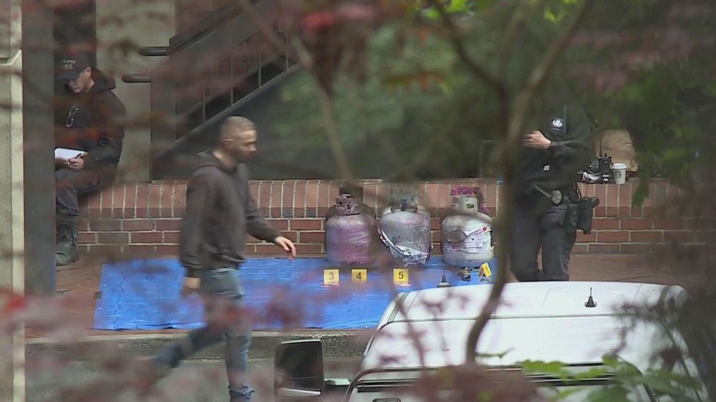 Driver found dead after crashing SUV filled with bombs into the MAC in ...