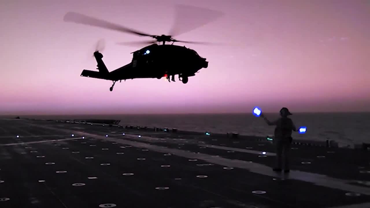 US Forces shows marines boarding vessel in Arabian Sea from helicopter ...