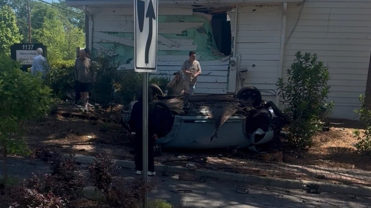 Car crashes into building in Roswell, 1 hospitalized