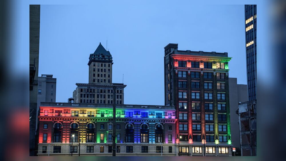 Downtown building lit up in honor of late non-profit leader