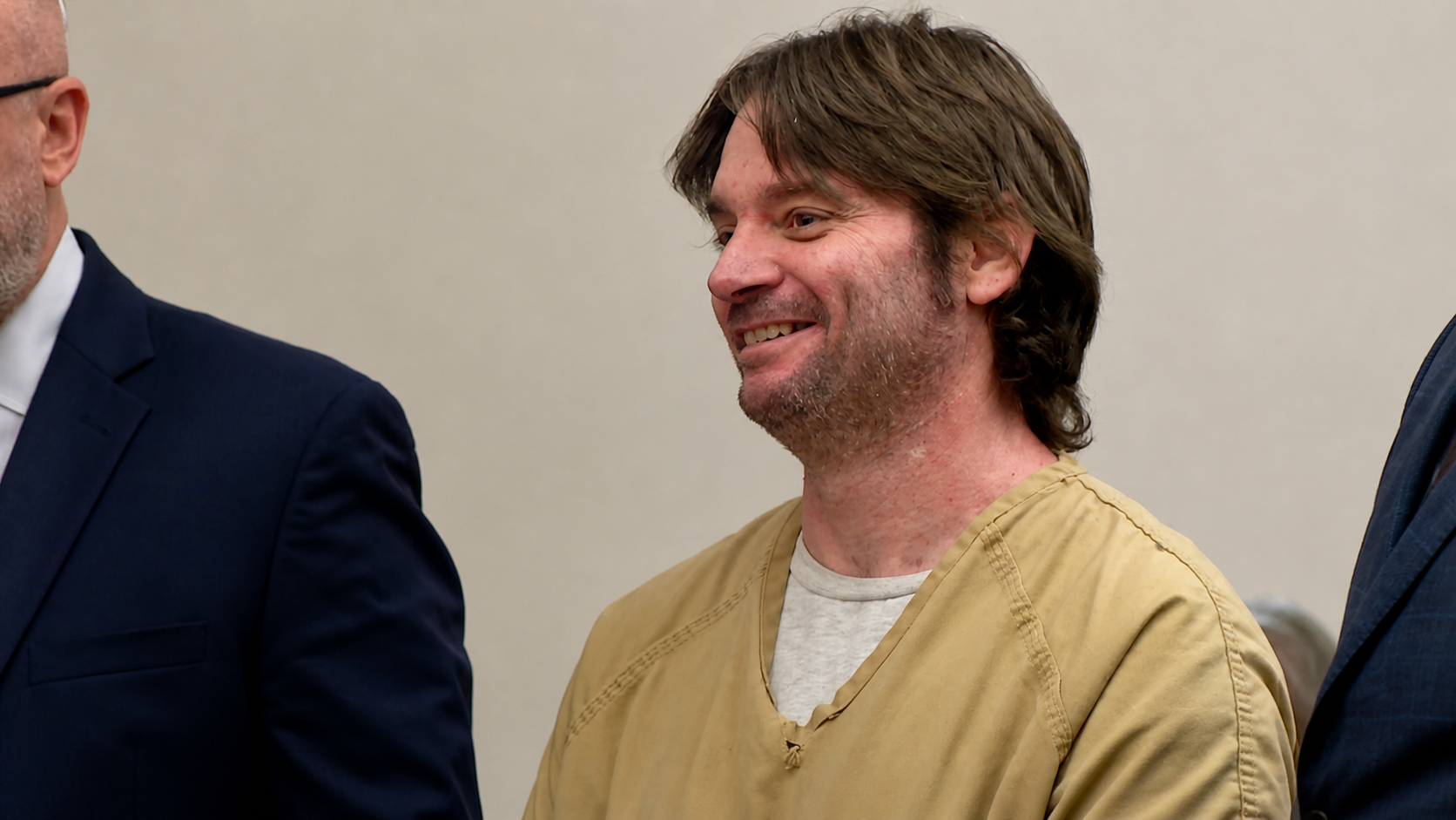 Man laughs as he admits to killing 11-year-old son and girlfriend
