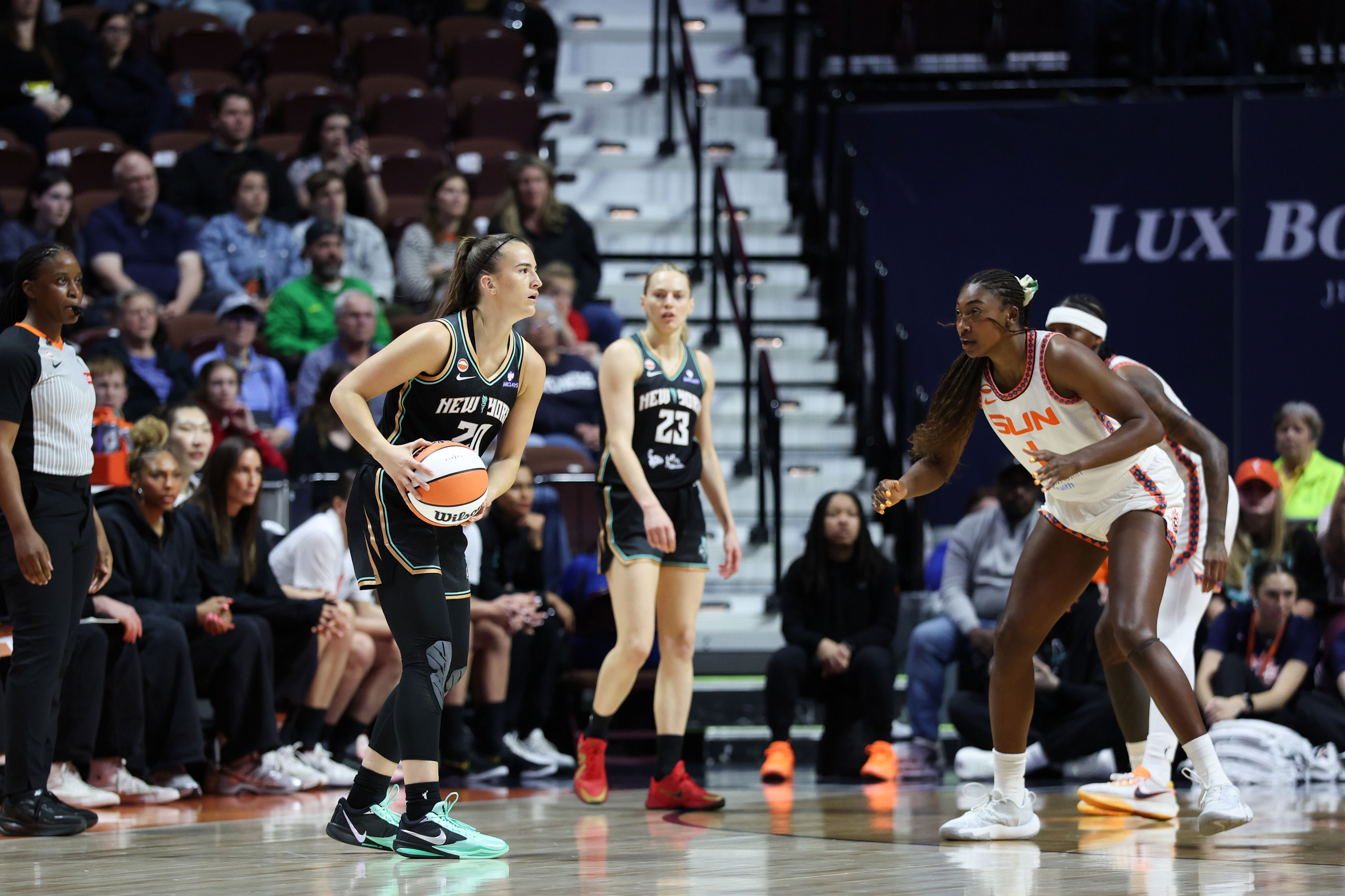 Sabrina Ionescu exits with apparent ankle injury in Liberty preseason scare