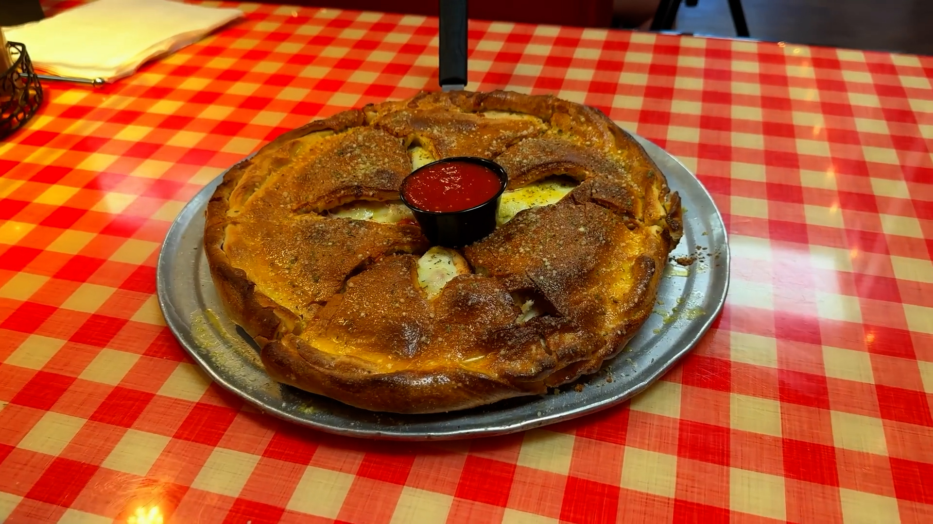 Man attempts stuffed 6-meat pizza challenge that thousands have failed