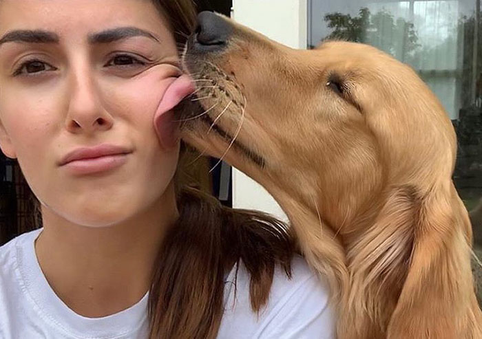 28 pics of a girl and her dogs sharing an unbreakable bond