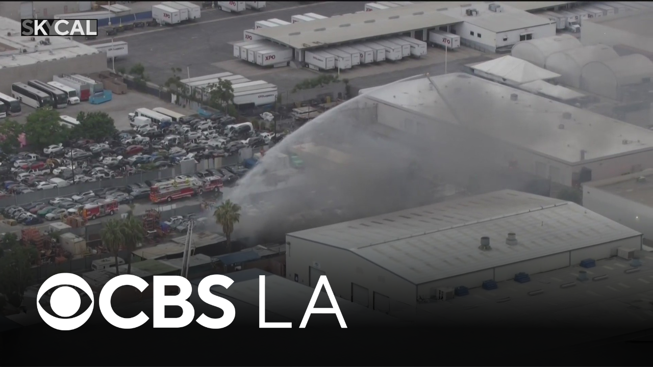 Los Angeles firefighters battle blaze at Pacoima auto salvage yard