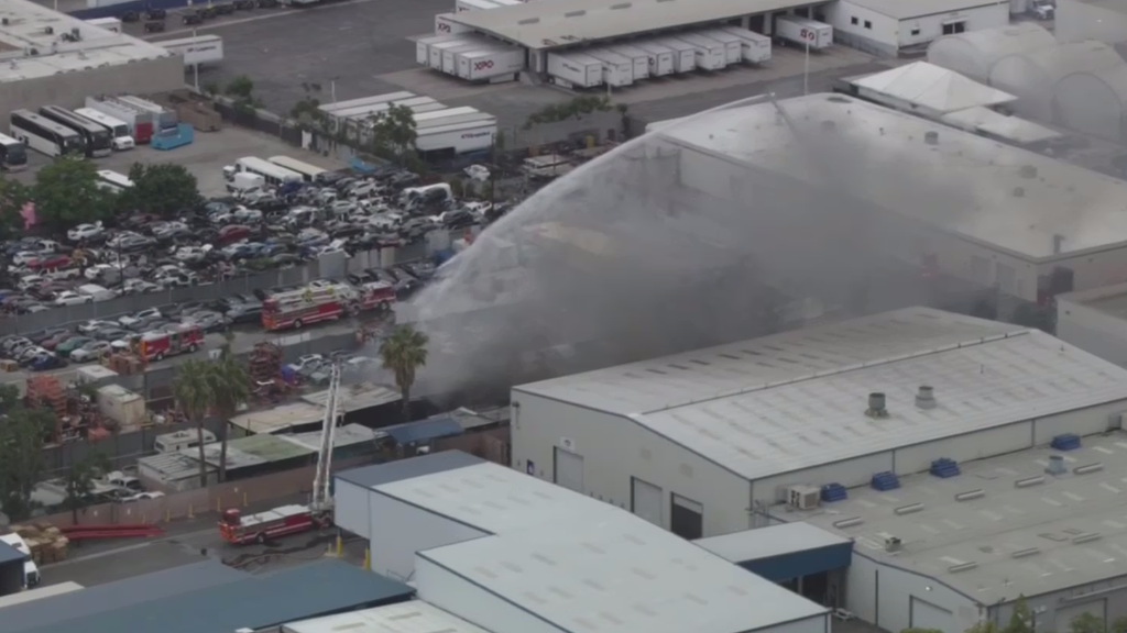 Los Angeles firefighters battle blaze at Pacoima auto salvage yard