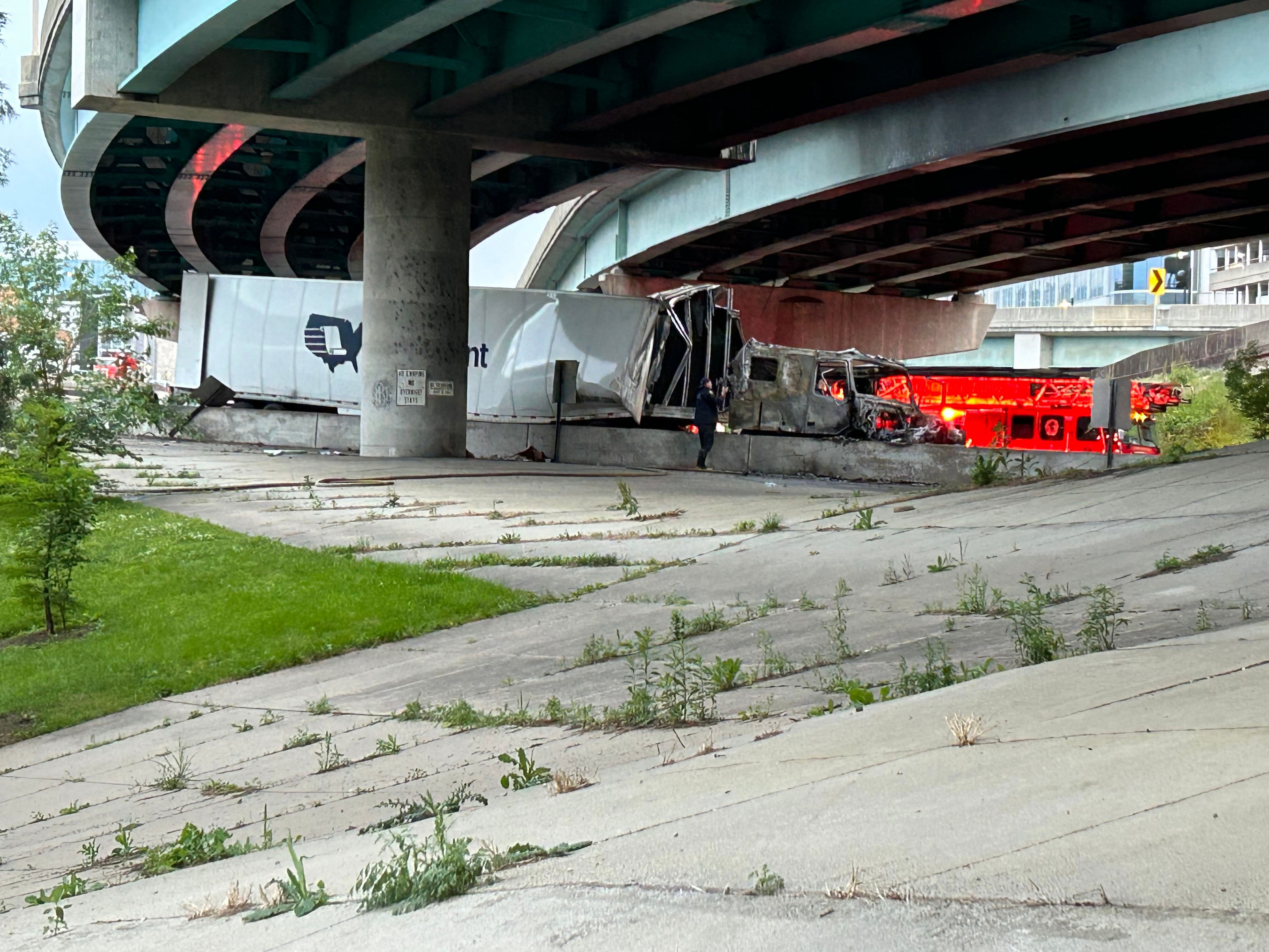 Driver dies in fiery semi crash, multiple downtown roads and exits closed