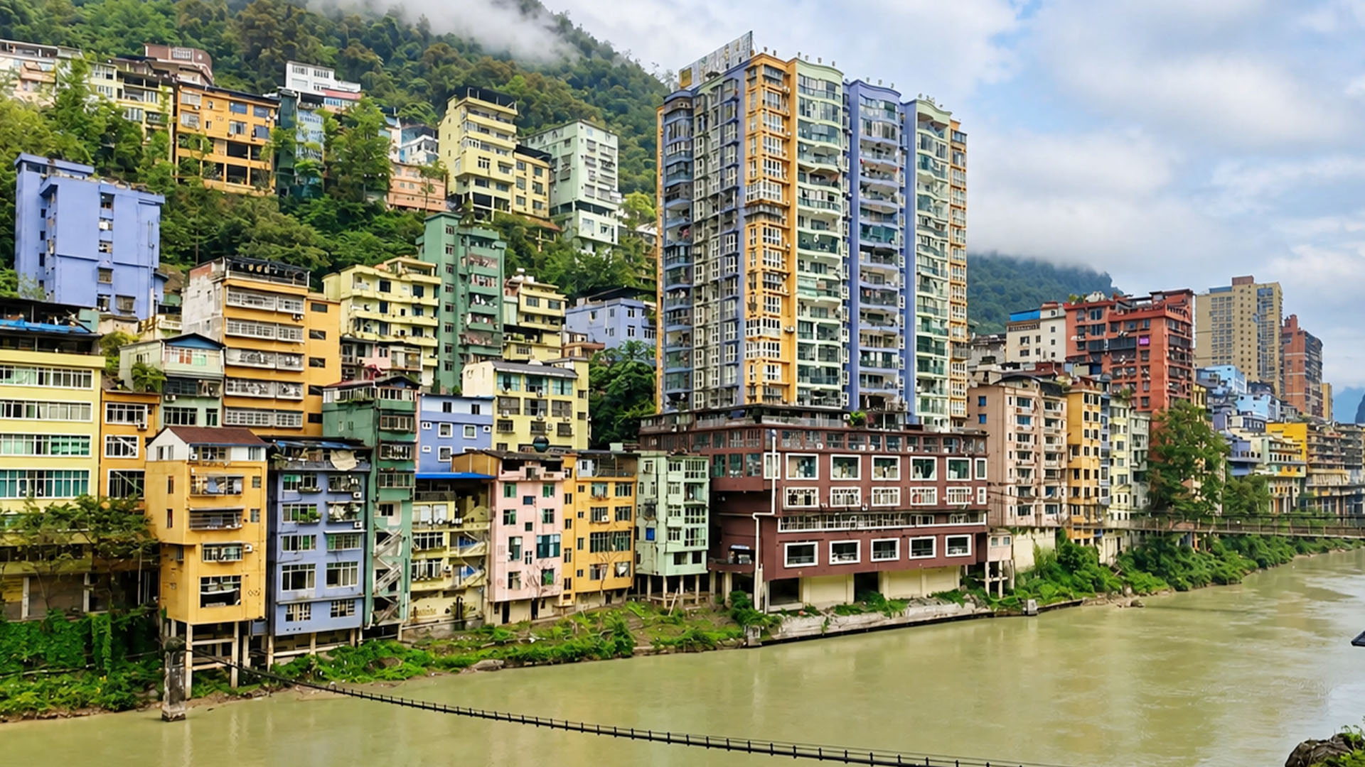 This unusual city feels trapped between steep mountains and river