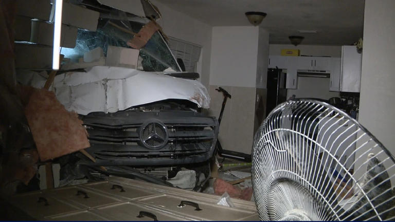 Van crashes into side of house in Orange County