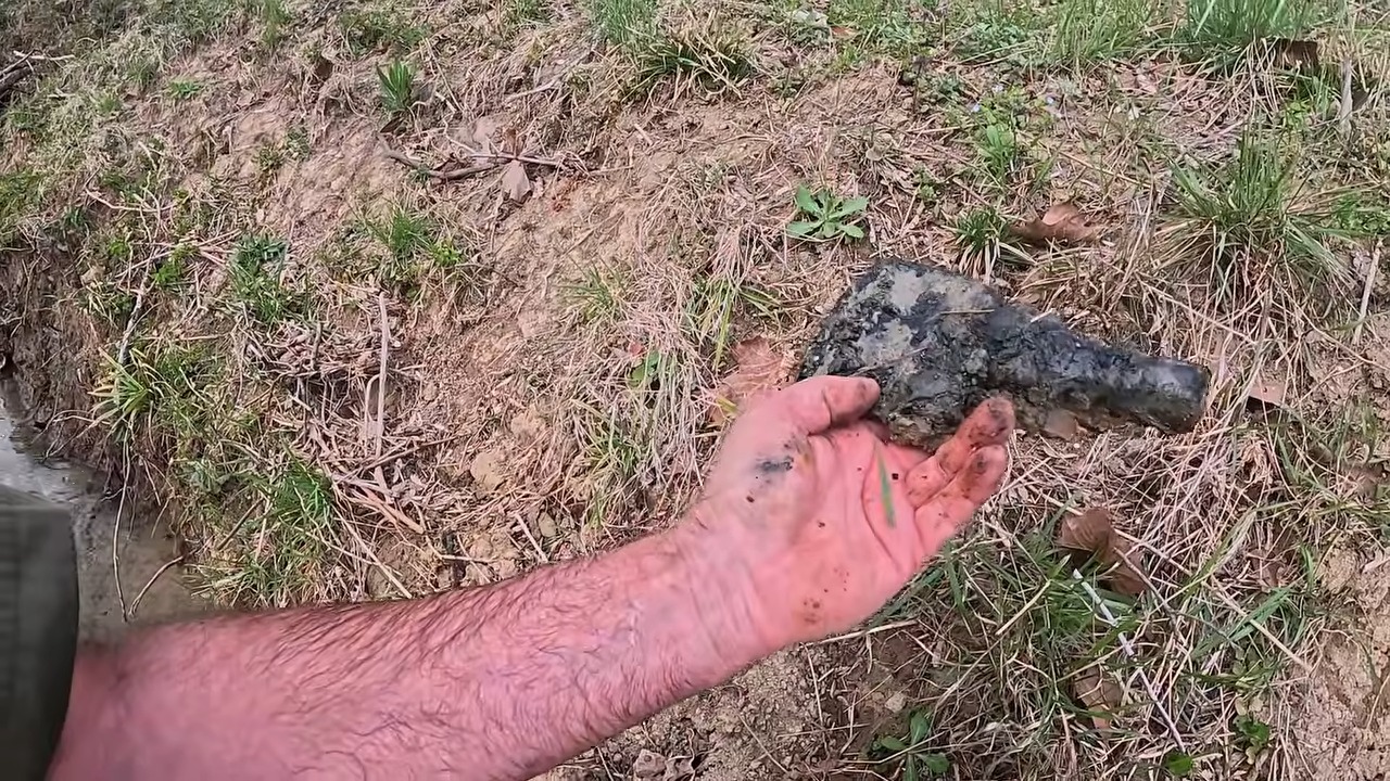 A river dump turned into a time capsule of axe heads, locks, and square ...