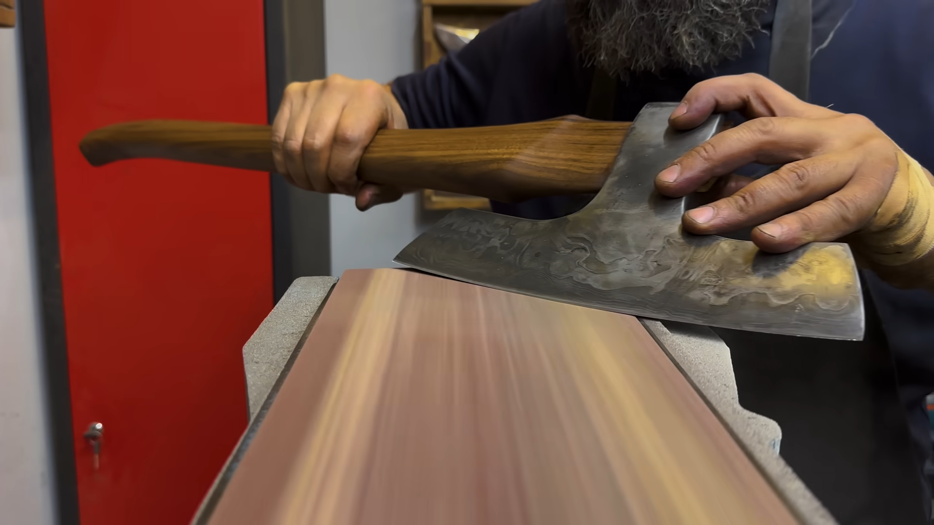This video shows how Damascus steel becomes an axe