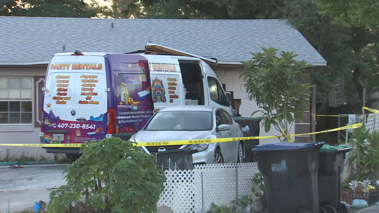 Van crashes into house in east Orange County