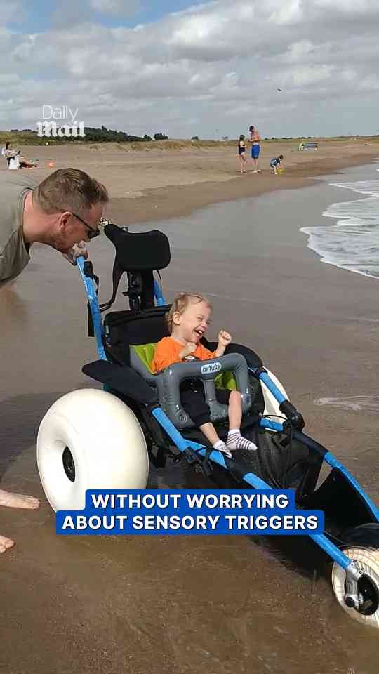 Beach wheelchair helps boy experience ocean for the first time