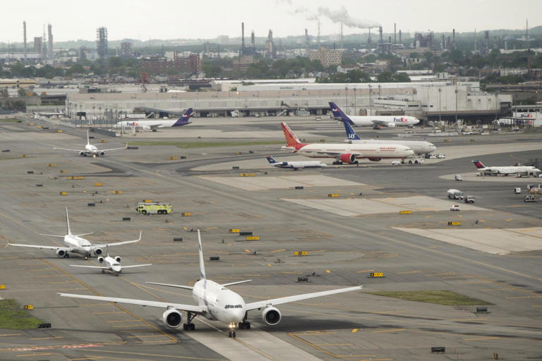 Plane hits truck and pole while landing at Newark Airport