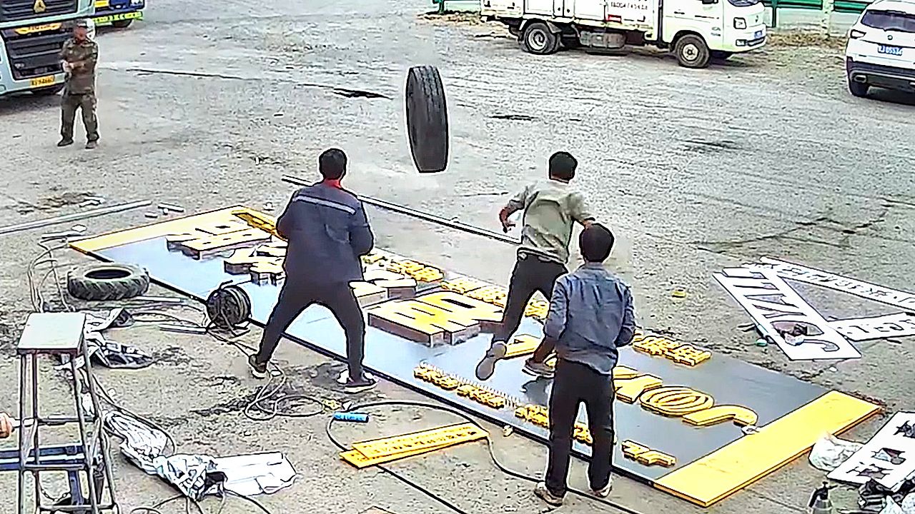 Runaway truck wheel hurtles toward workers in near-miss caught on CCTV