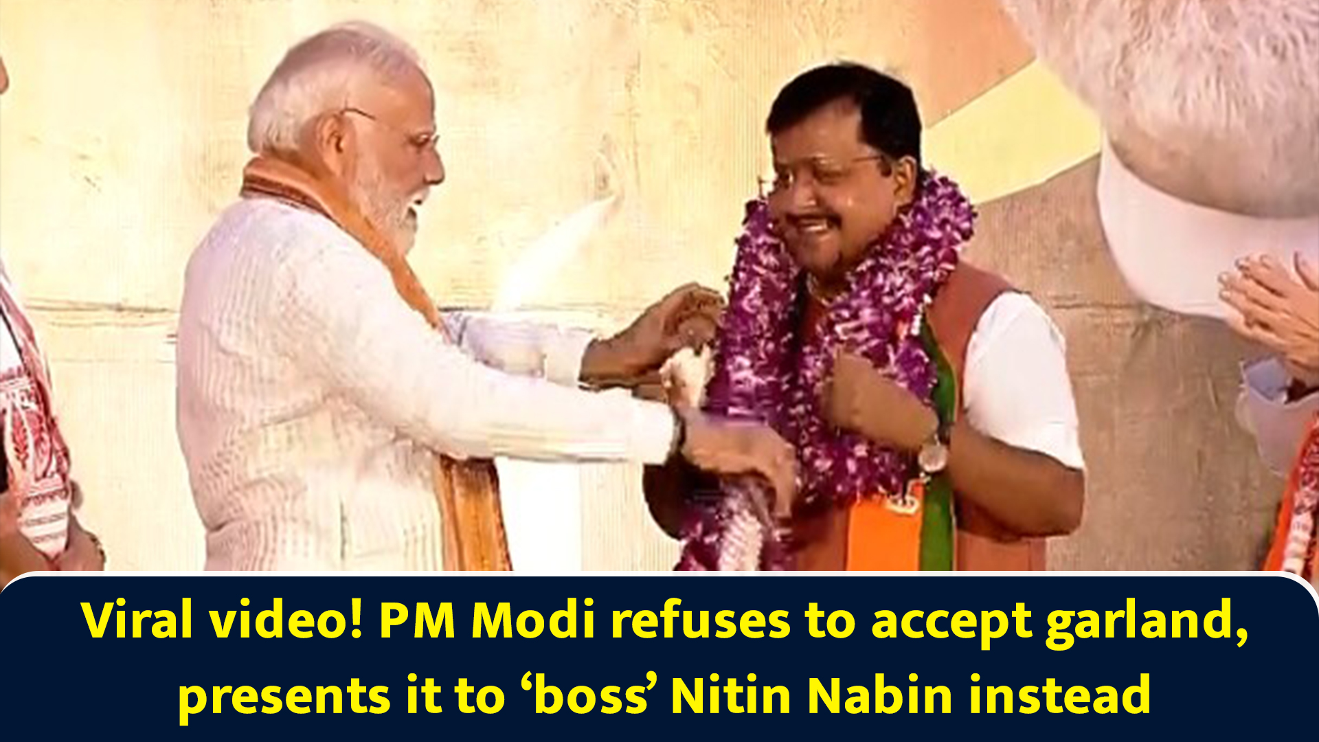 Viral video! PM Modi refuses to accept garland, presents it to 'boss ...
