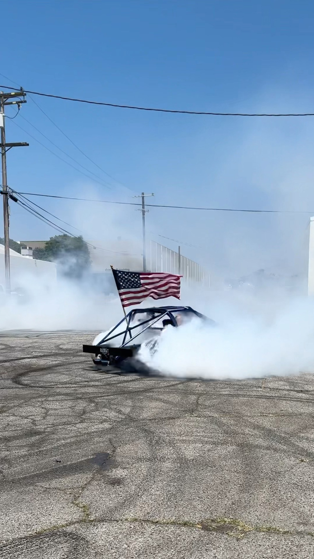 Corvette burnout creating massive smoke cloud