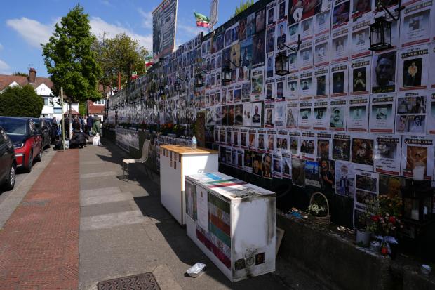 Arson with intent to endanger life arrests after attack on memorial wall