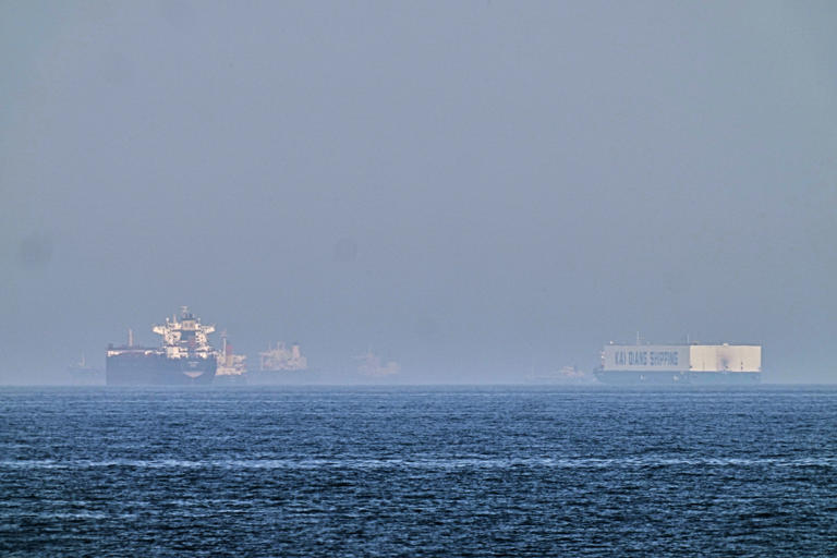 US destroyers and cargo ships cross Strait of Hormuz after Iran warning