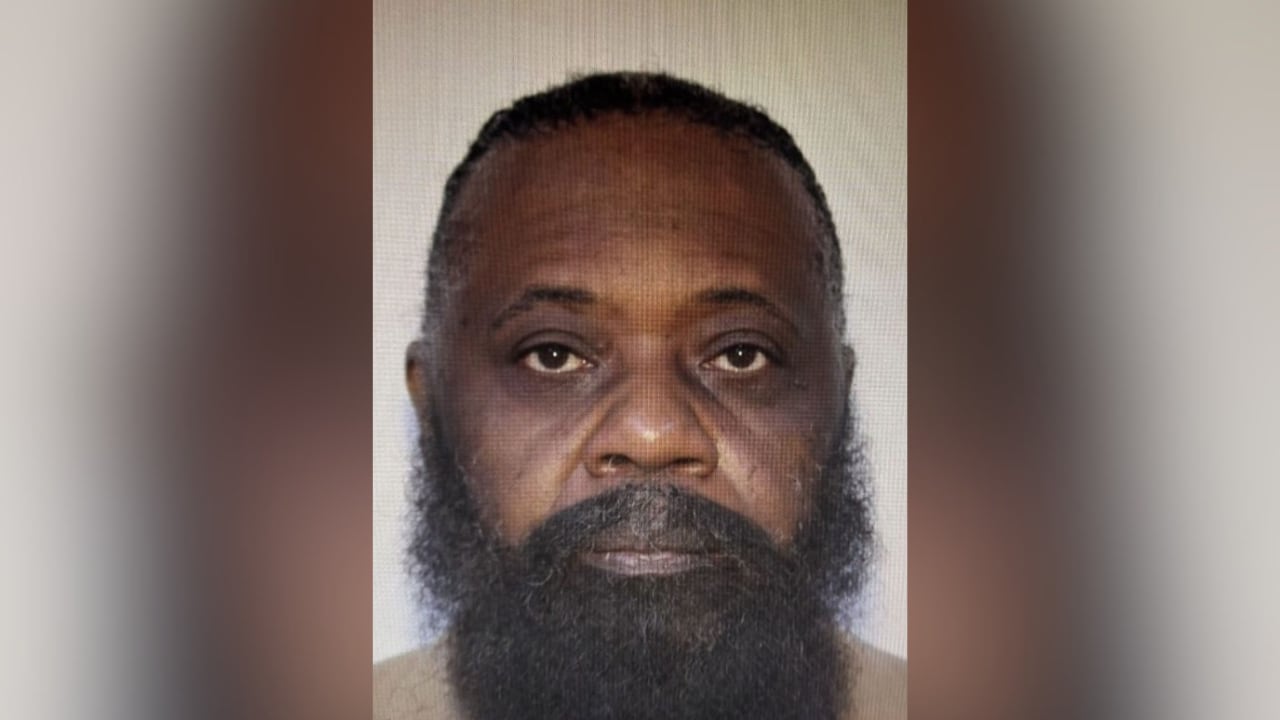 Man arrested after person found dead in burning car in Covington