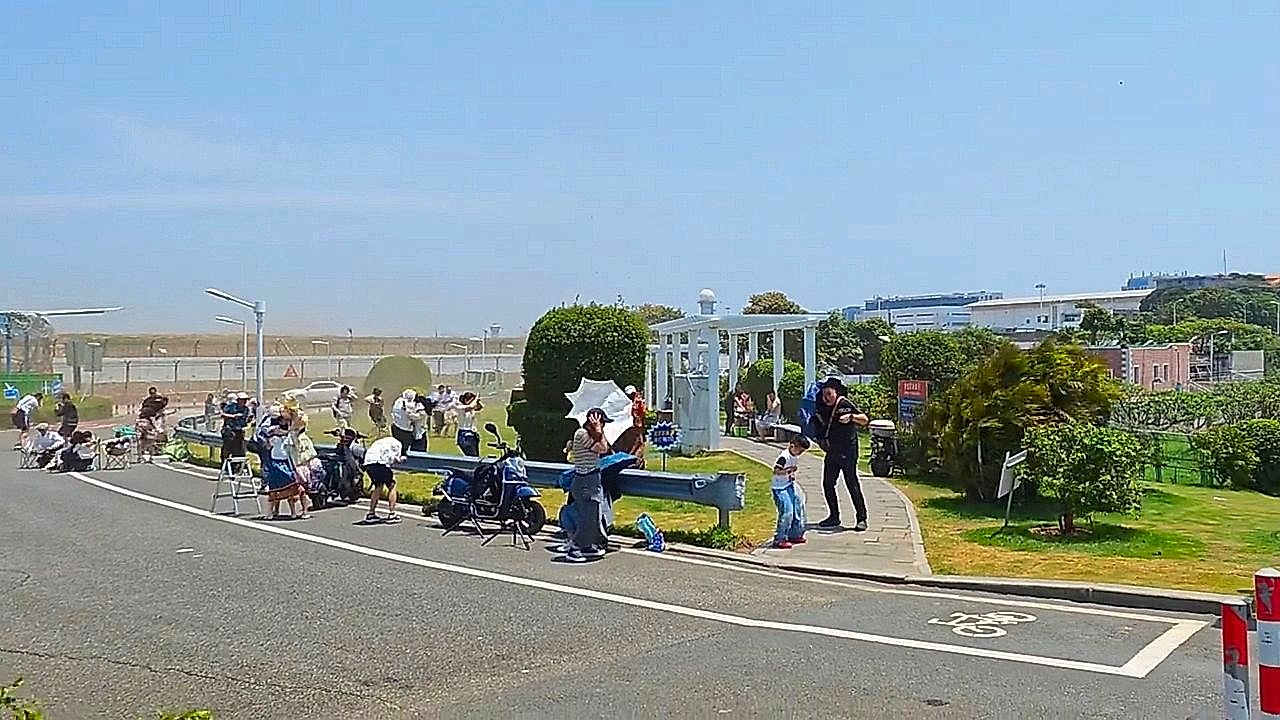 Spectators caught off guard as jet blast erupts during takeoff