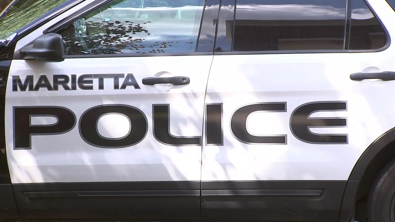 61-year-old Marietta woman shot and killed; neighbor arrested, police say