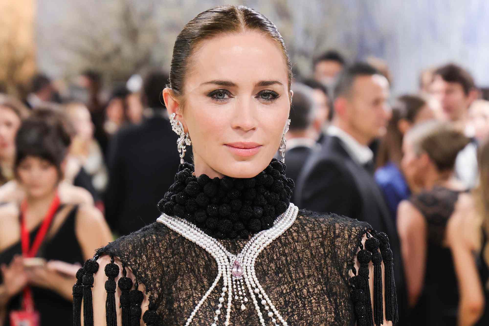 Emily Blunt shines in pearl body necklace that costs half-a-million at ...