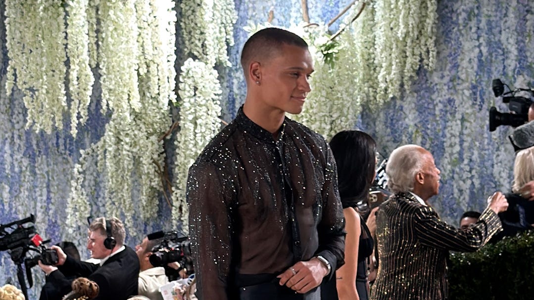 Tyriq Withers arrives for his first Met Gala in Louis Vuitton