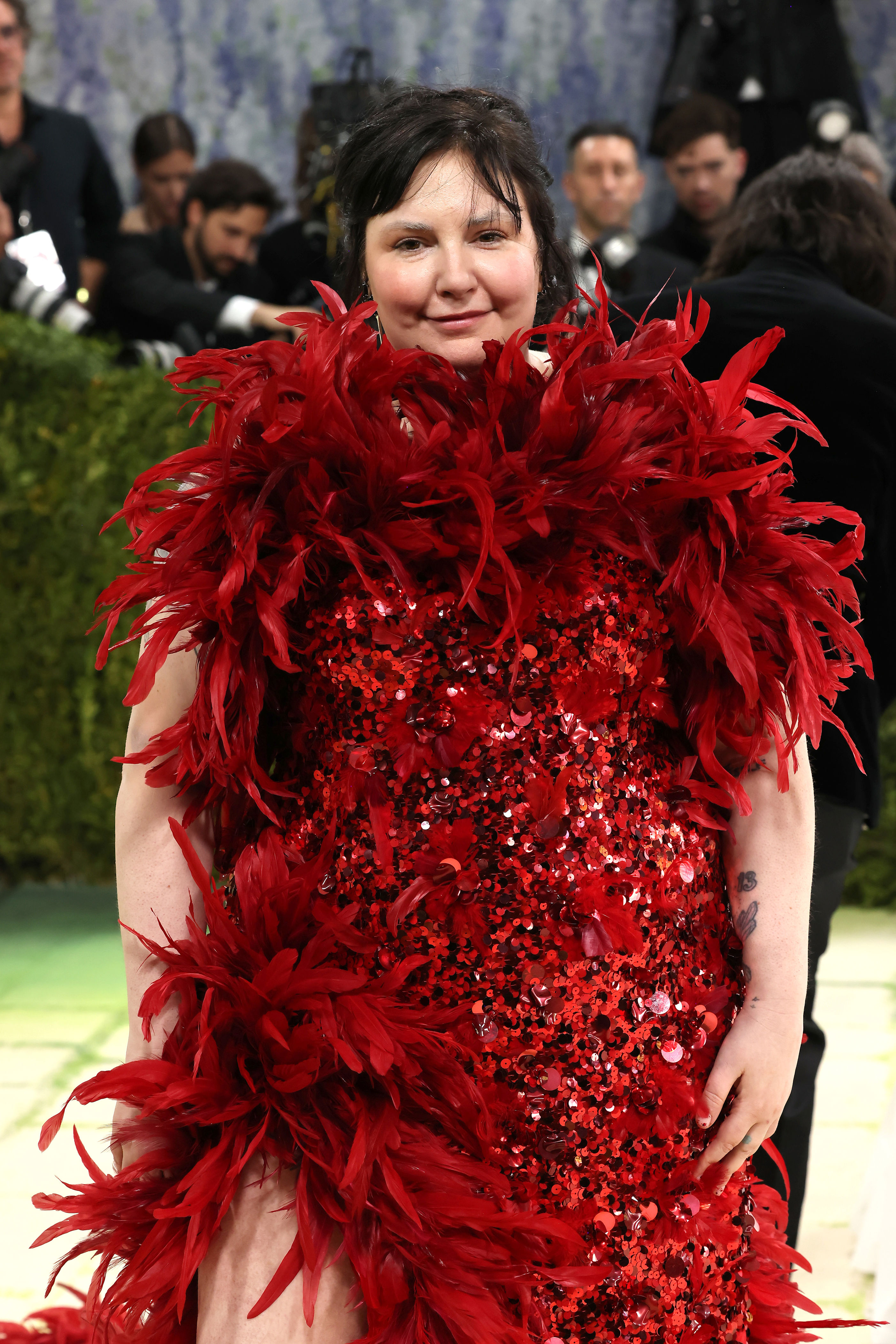 Lena Dunham goes full showgirl in red feathers and sequins on Met Gala ...