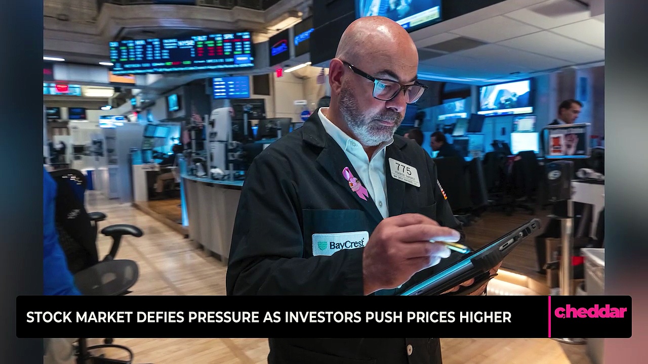 Stock market defies pressure as investors push prices higher