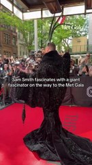 Sam Smith wears a giant fascinator on the way to the 2026 Met Gala