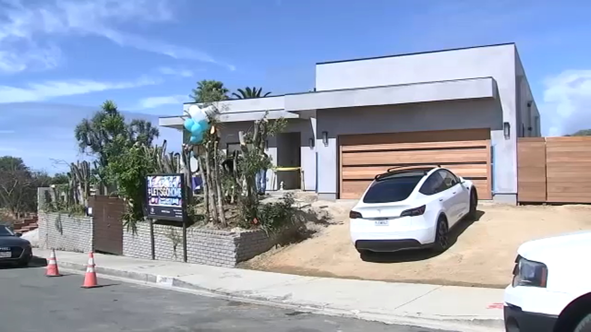 Family celebrates moving into new home after rebuilding what the ...