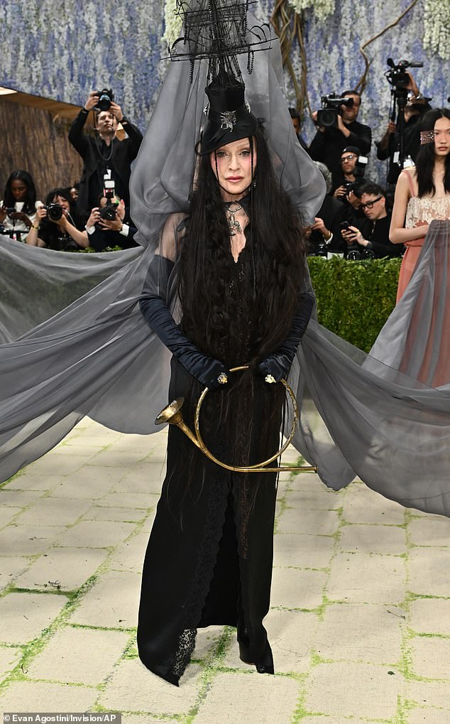 Madonna, 67, channels witchy energy for Met Gala 2026 in gothic lace ...