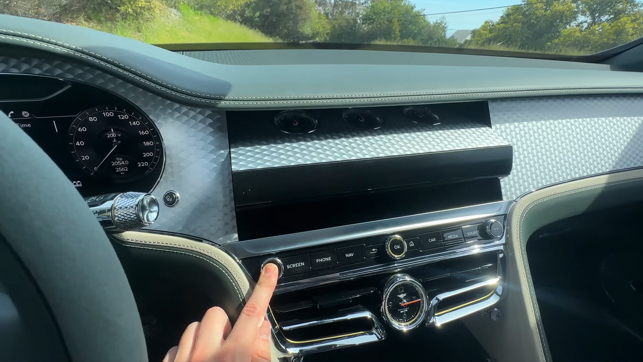 Advanced Bentley rotating display merging digital tech with classic luxury